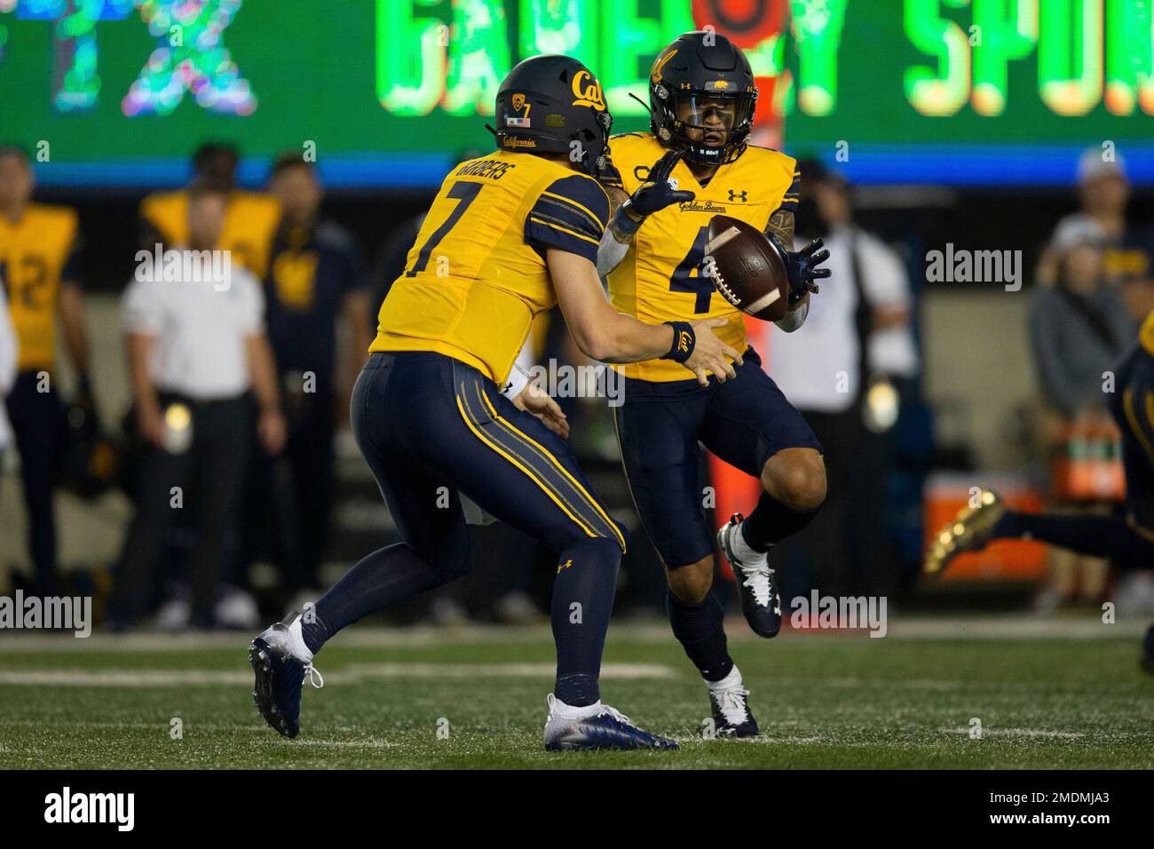 California quarterback Chase Garbers (7) pitches the ball to wide ...