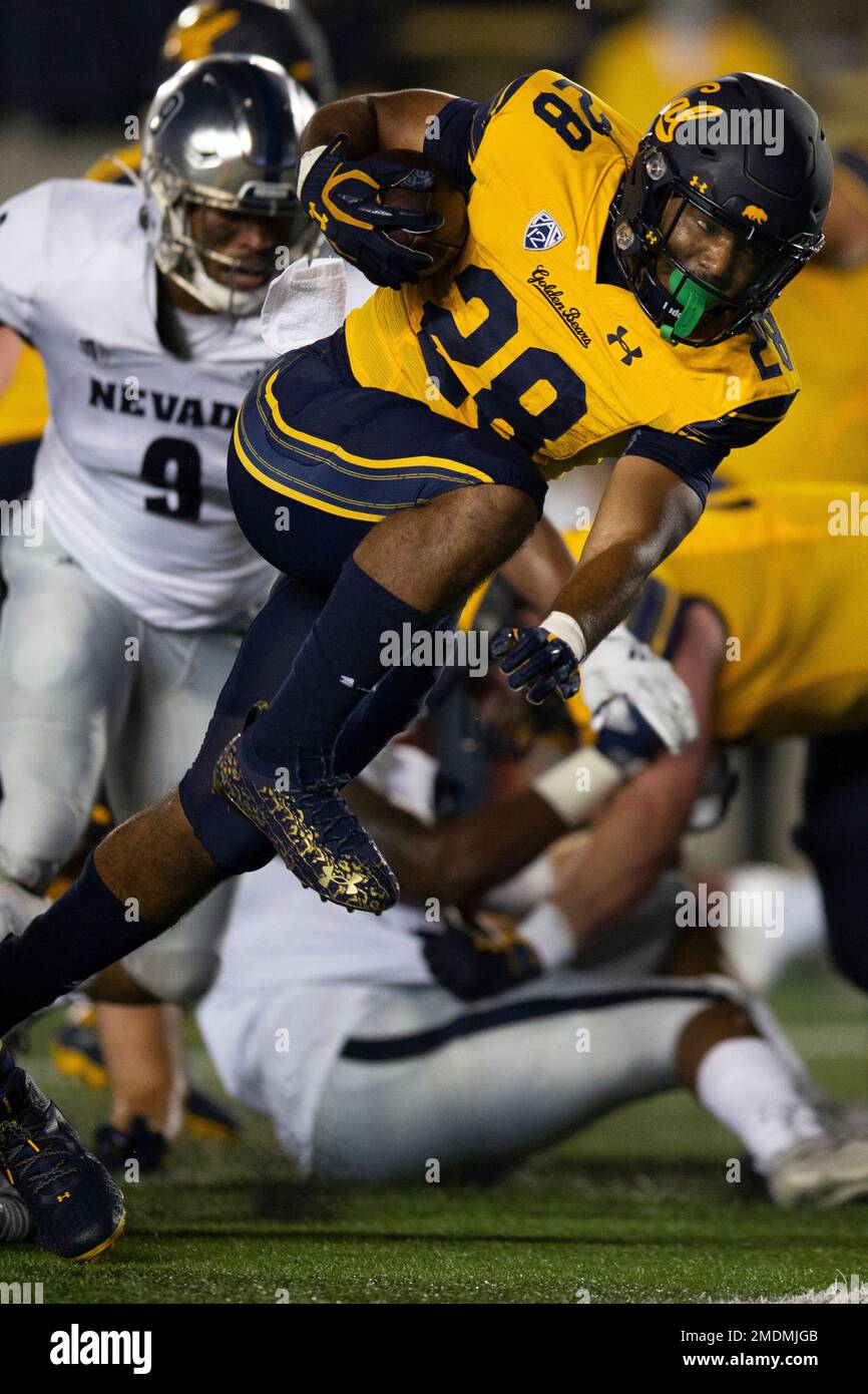 California running back Damien Moore (28) breaks a big gainer against ...