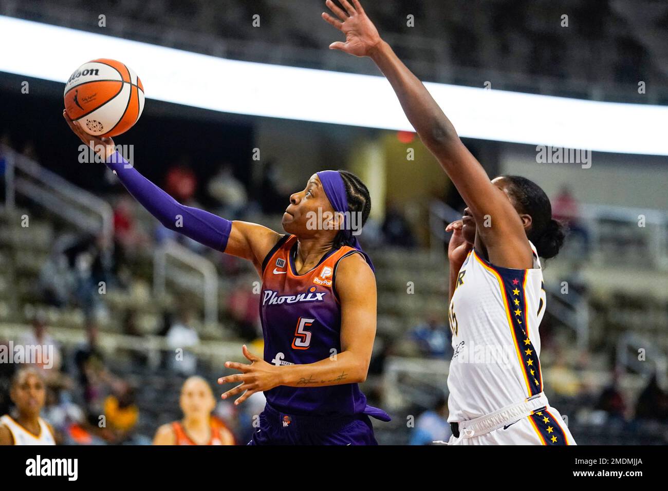 Phoenix Mercury guard Shey Peddy (5) shoots in front of Indiana Fever ...