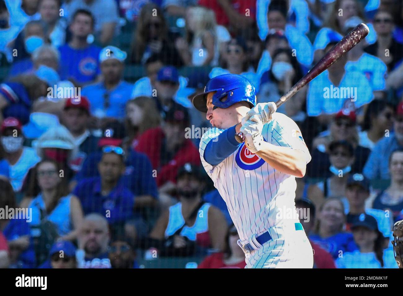Chicago Cubs' Frank Schwindel hits an RB-single during the eighth ...
