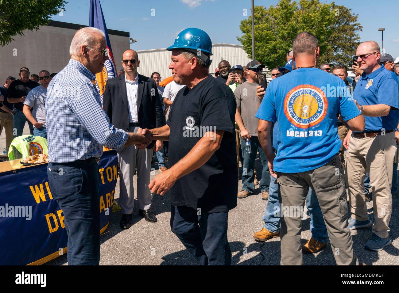 President Joe Biden greets labor union members of the International Brotherhood of Electrical ...