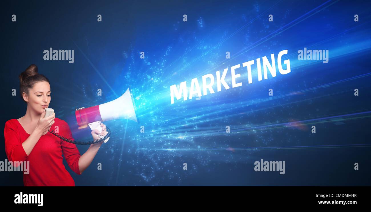 Young person shouting in loudspeaker Stock Photo - Alamy