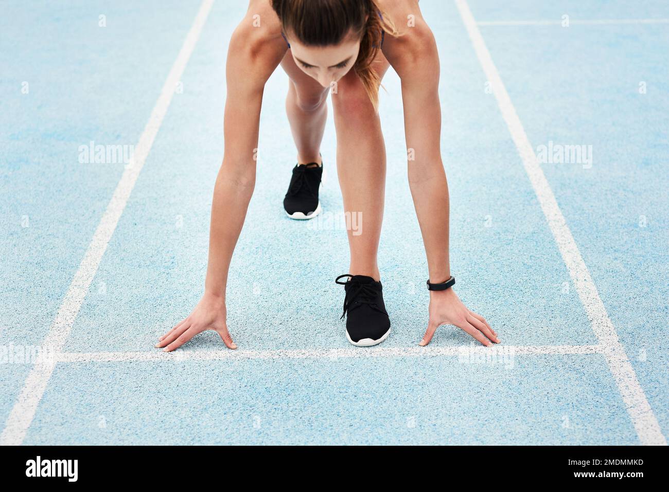 Start strong, finish stronger. an unrecognizable young female athlete ...
