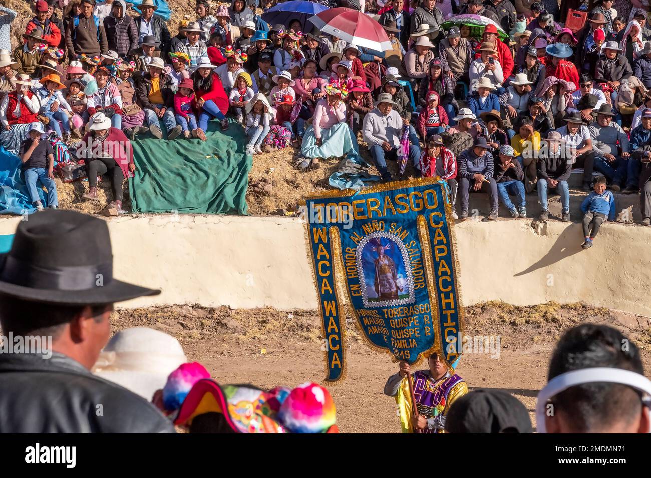 Crowd waiting for the bullfight, Capachica, Peru Stock Photo - Alamy