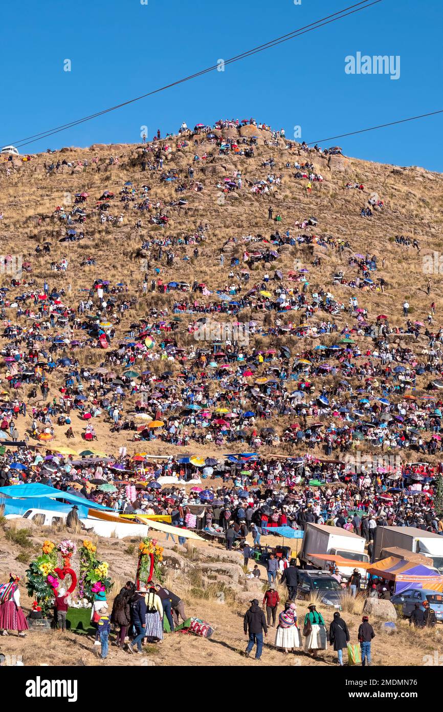 Crowd on a hill waiting for the bullfight, Capachica, Peru Stock Photo ...