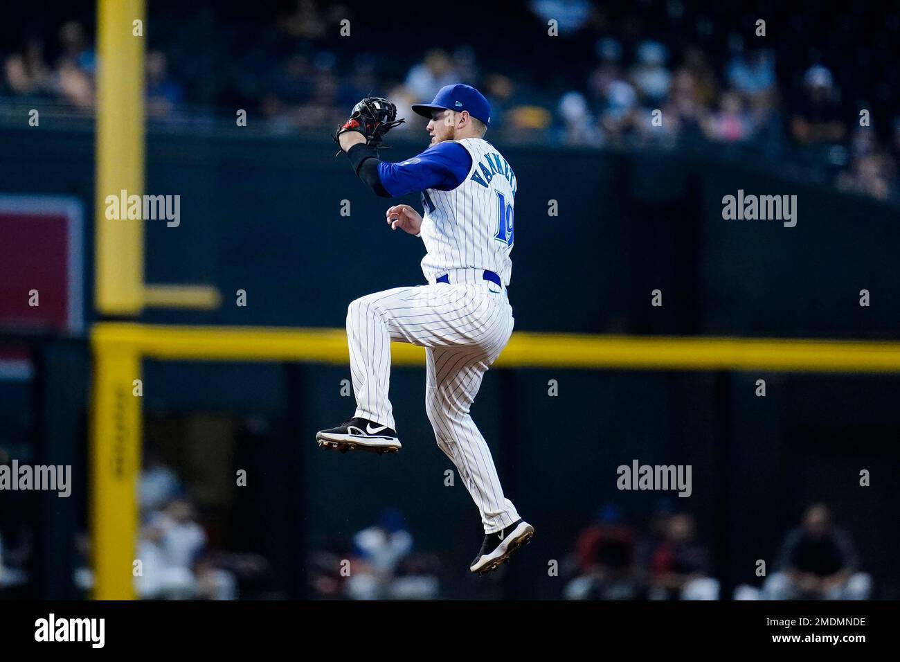 Arizona Diamondbacks third baseman Josh VanMeter jumps to make a catch ...