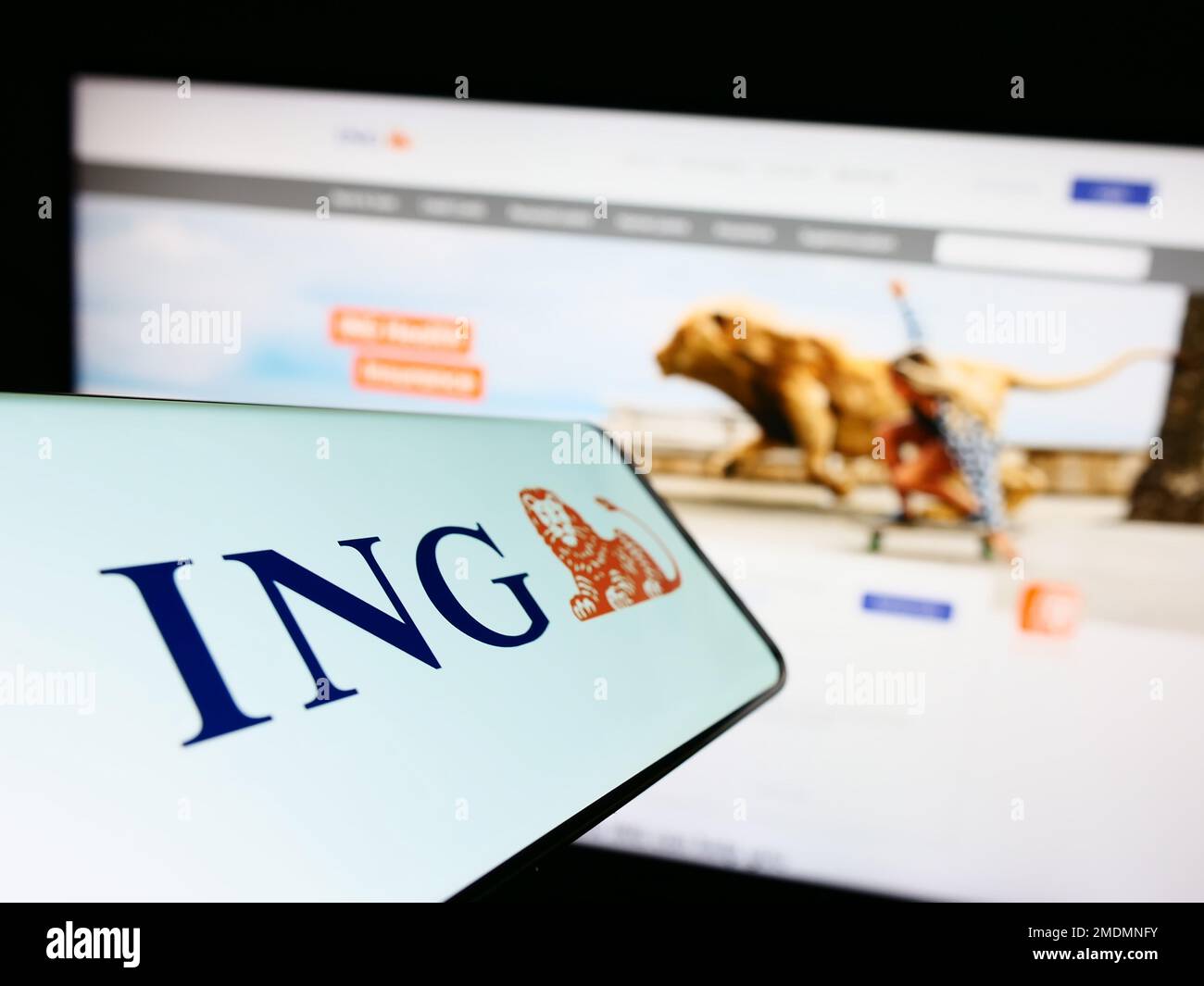 Mobile phone with logo of Dutch financial services company ING Groep N ...