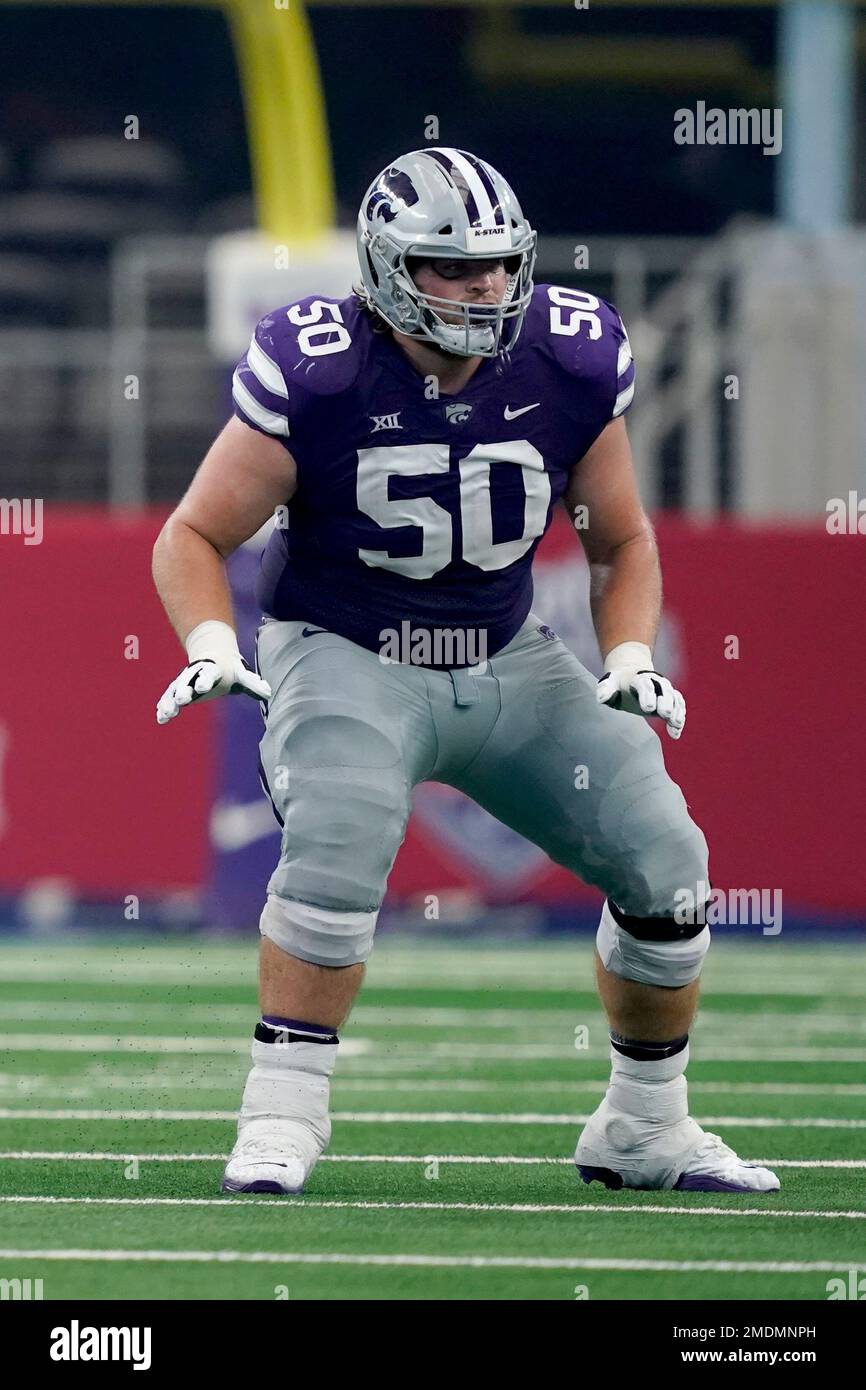 Kansas State offensive lineman Cooper Beebe (50) defends during an NCAA college football game ...