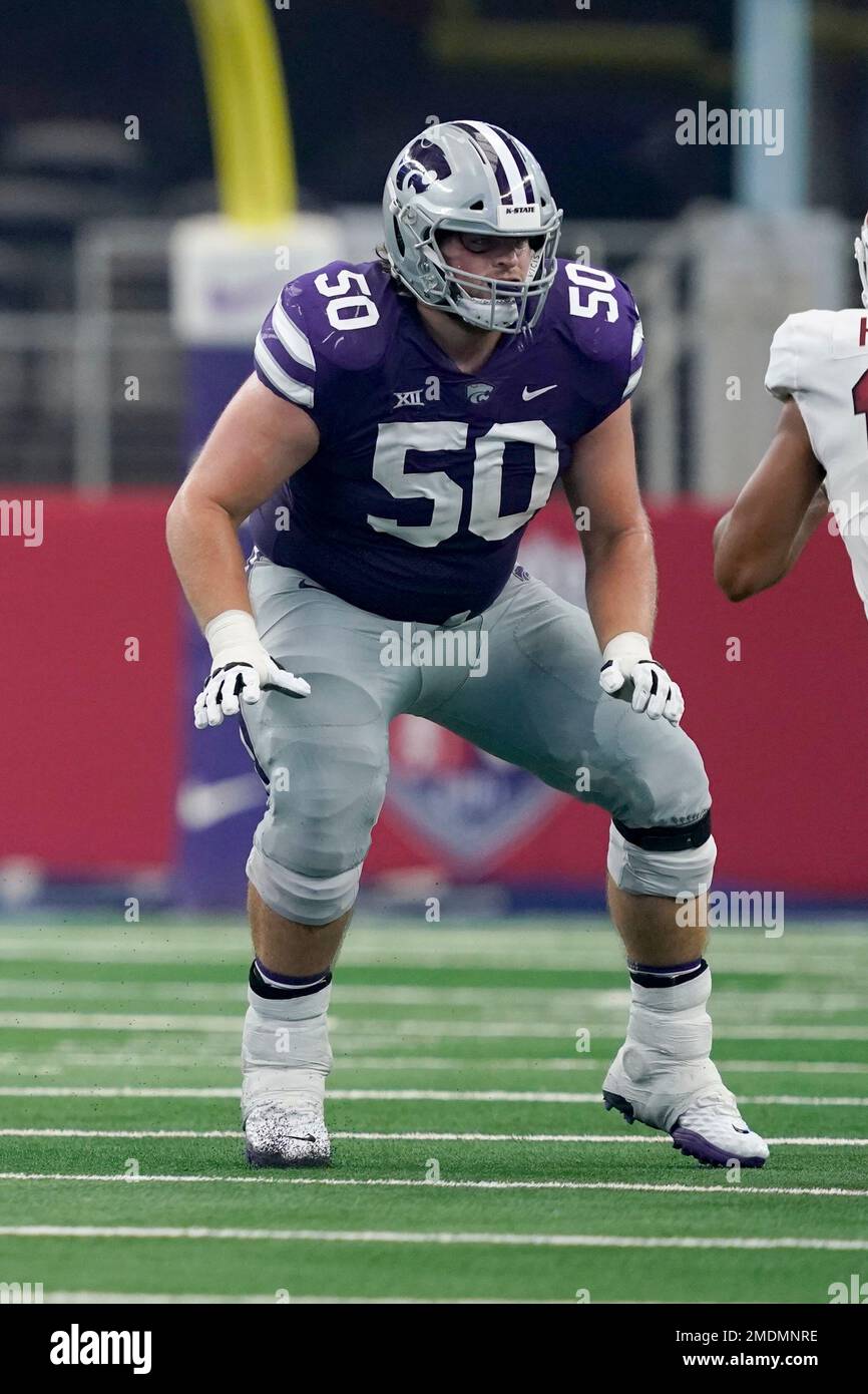 Kansas State offensive lineman Cooper Beebe (50) defends during an NCAA ...