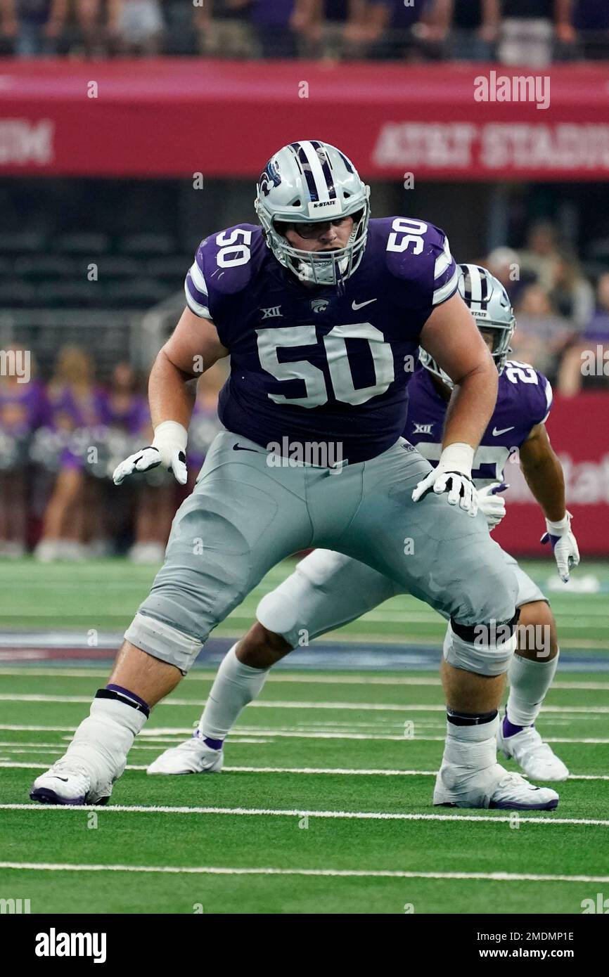 Kansas State offensive lineman Cooper Beebe (50) defends during an NCAA college football game ...