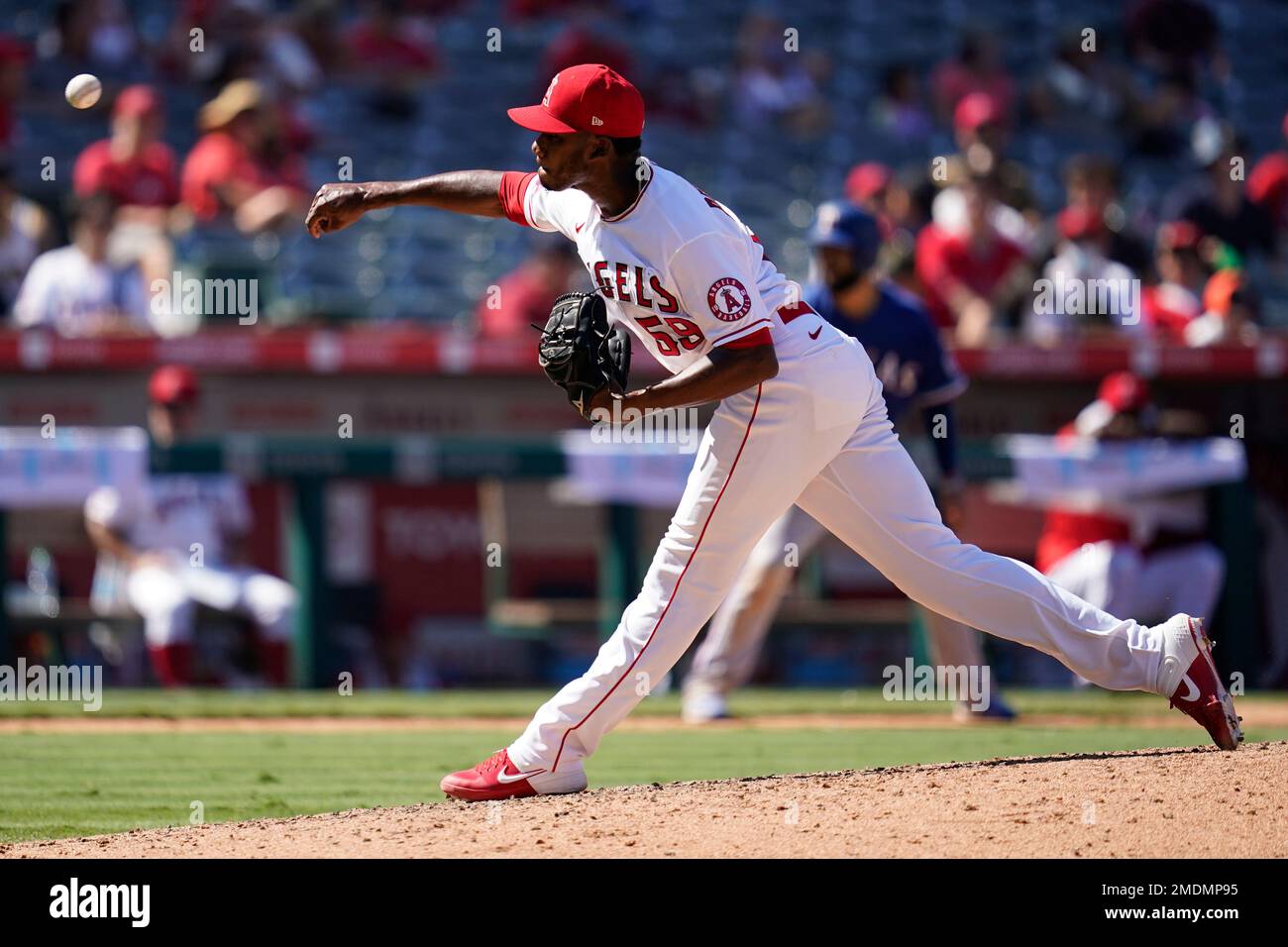 Los Angeles Angels relief pitcher Packy Naughton (58) throws during a ...