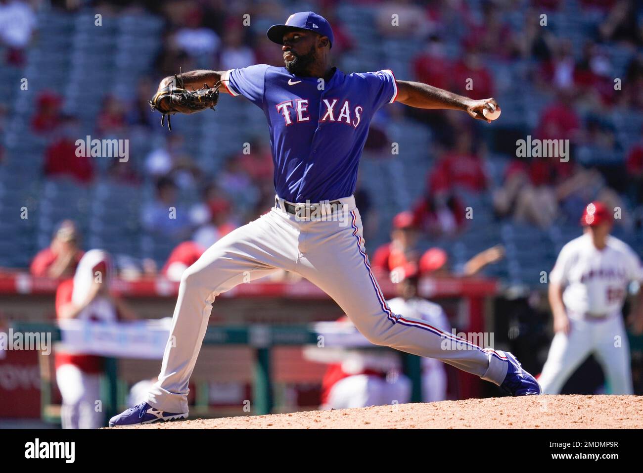 Texas Rangers starting pitcher Taylor Hearn (52) throws during the ...