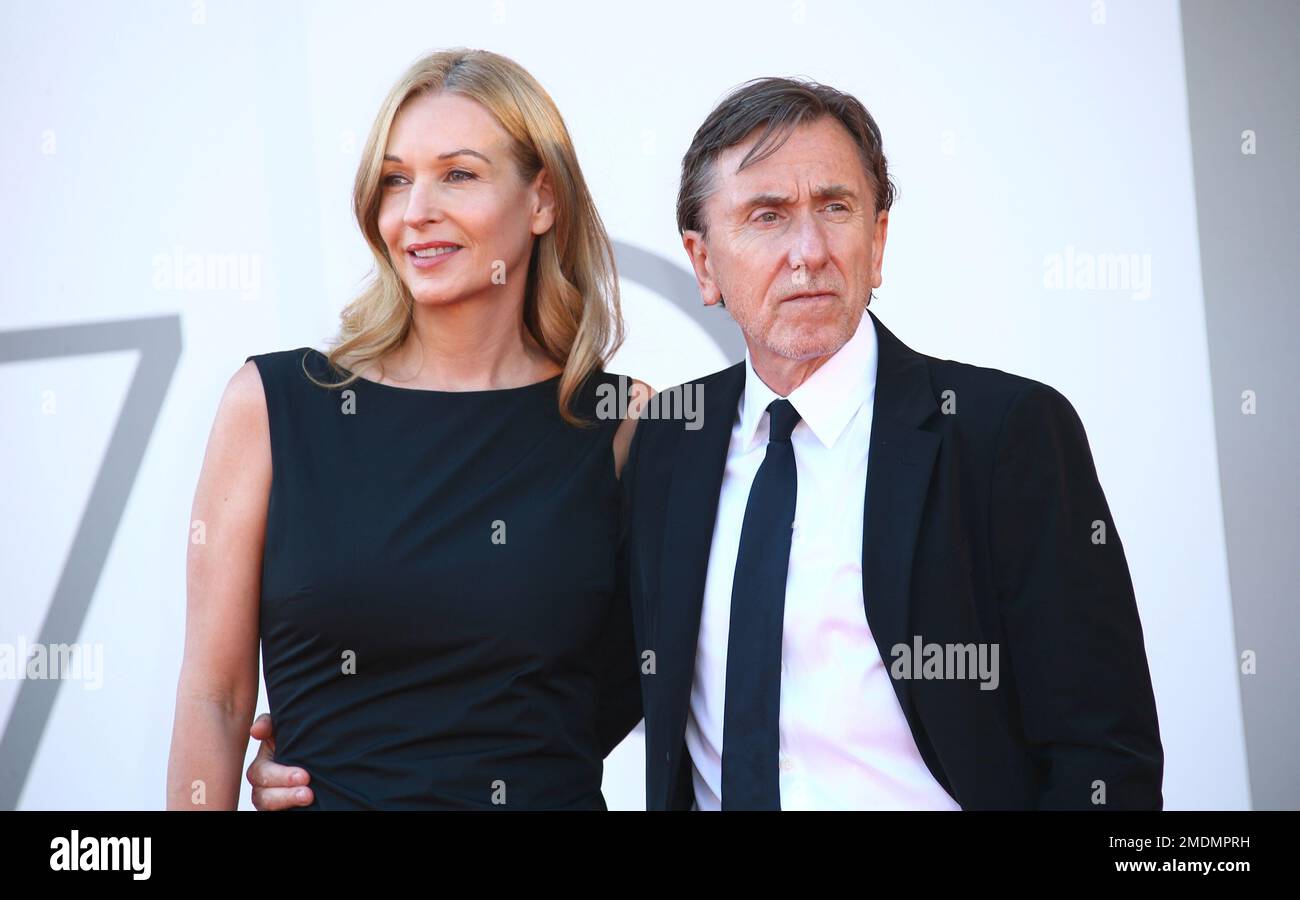 Tim Roth, right, and Nikki Butler pose for photographers upon arrival ...