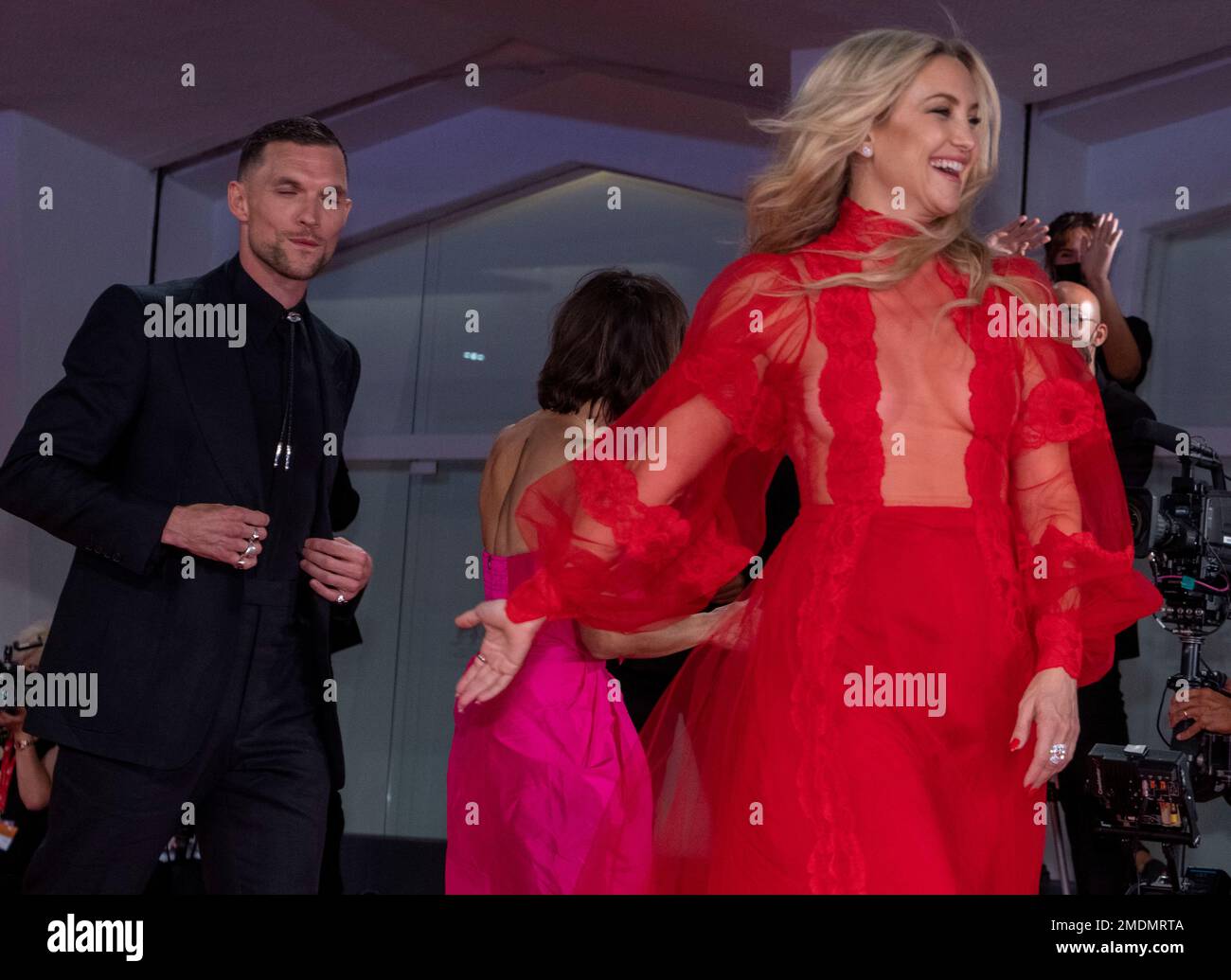 Kate Hudson, right, and Ed Skrein pose for photographers upon arrival ...