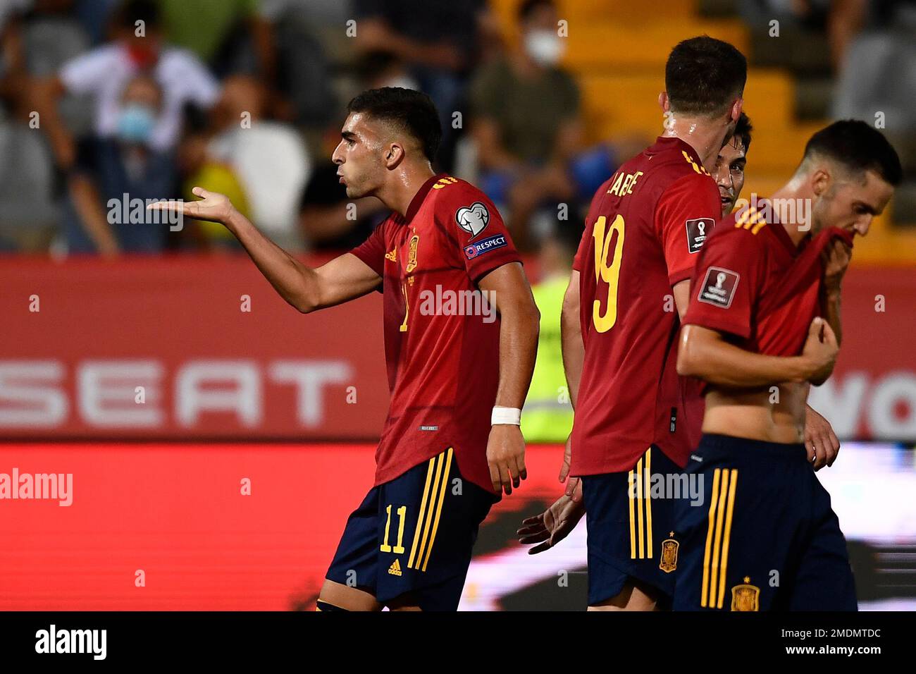 Spain's Ferran Torres, left, celebrates after Spain's Carlos Soler ...