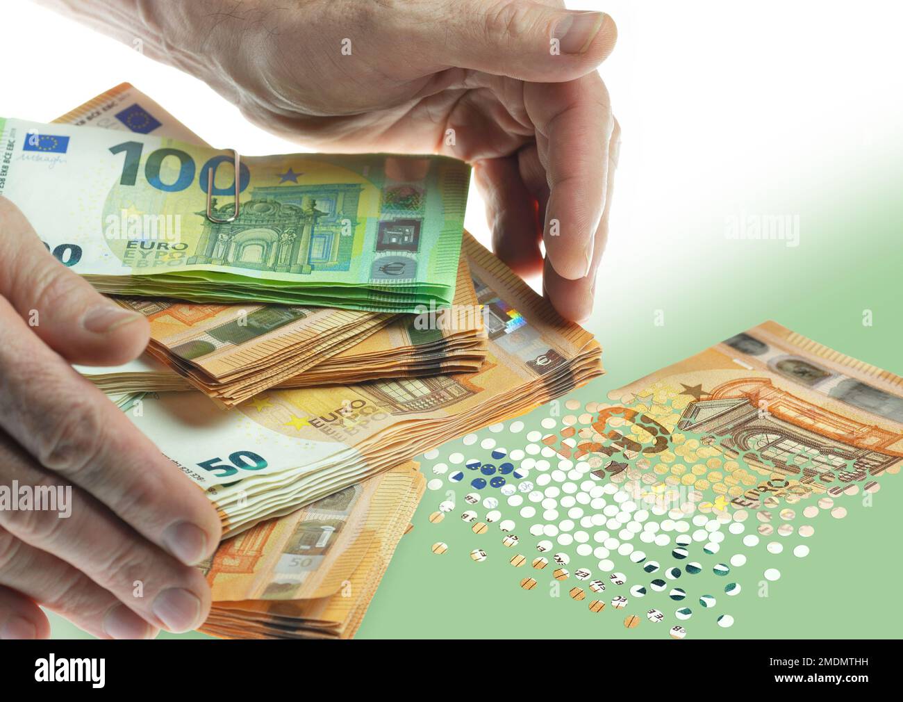 Hands grabbing stacks of euro bills. A 50 euro bill has turned into ...