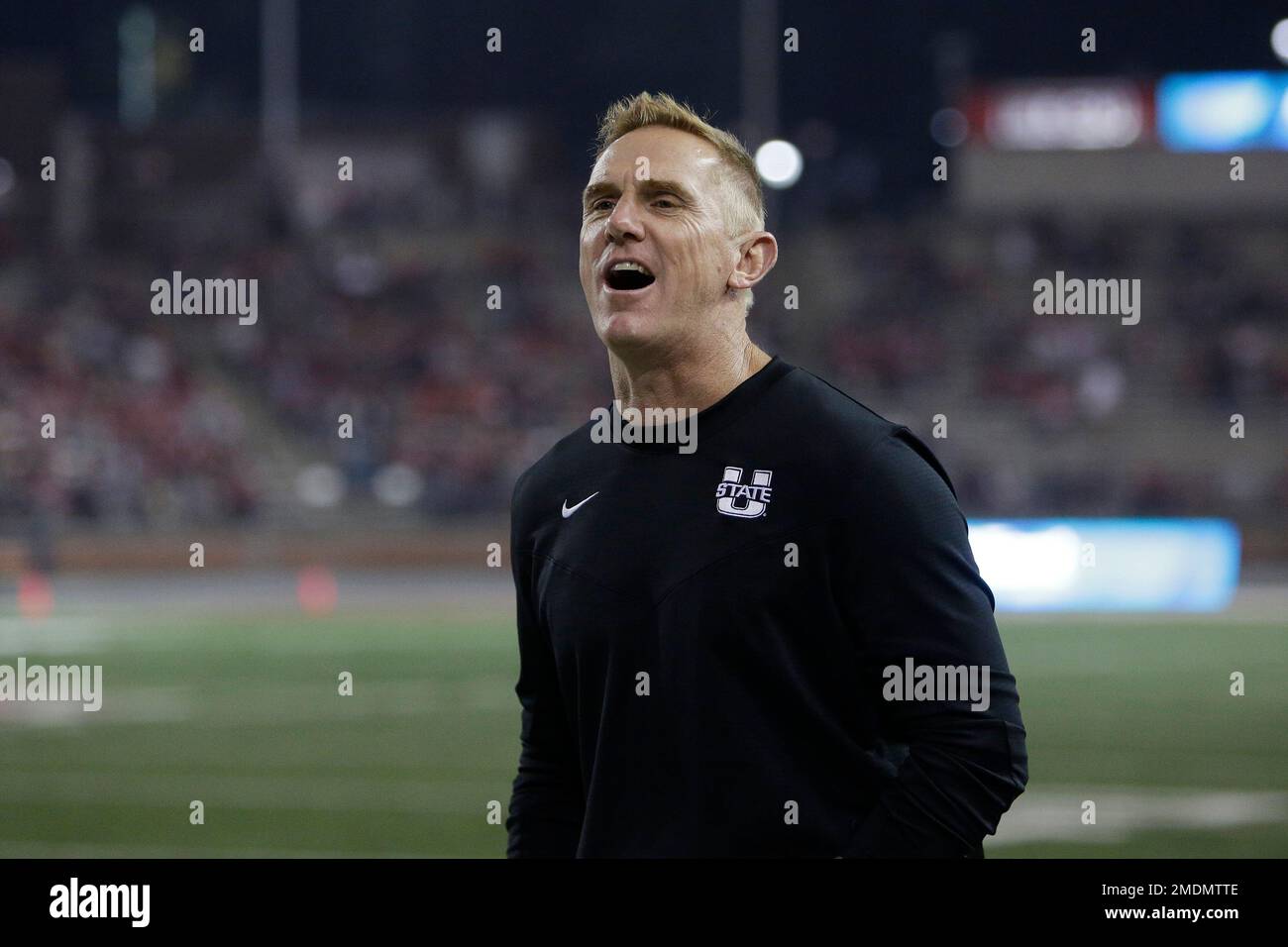 Utah State head coach Blake Anderson speaks to an official during the ...