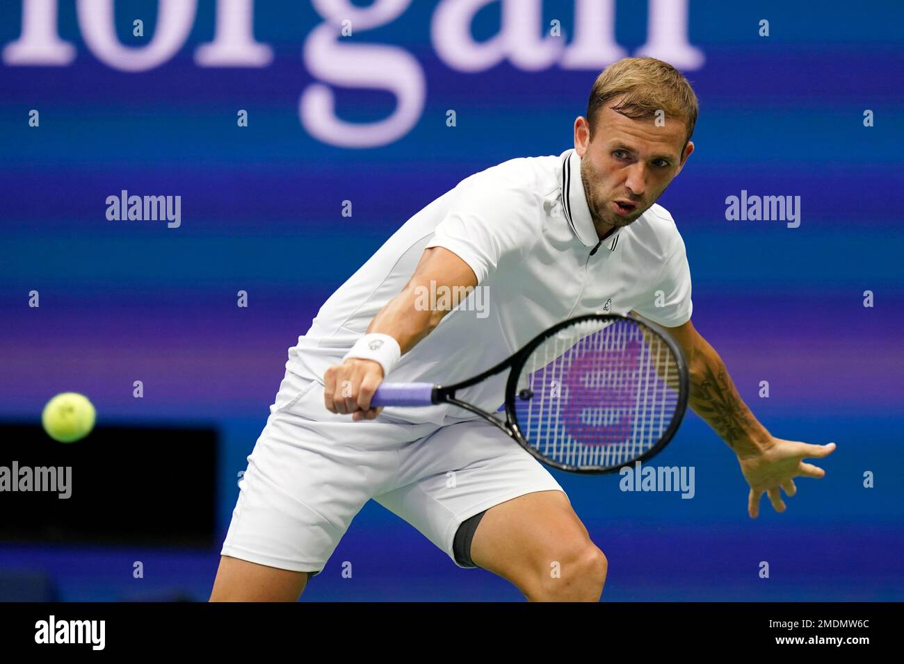 Daniel Evans, of the United Kingdom, returns to Daniil Medvedev, of ...