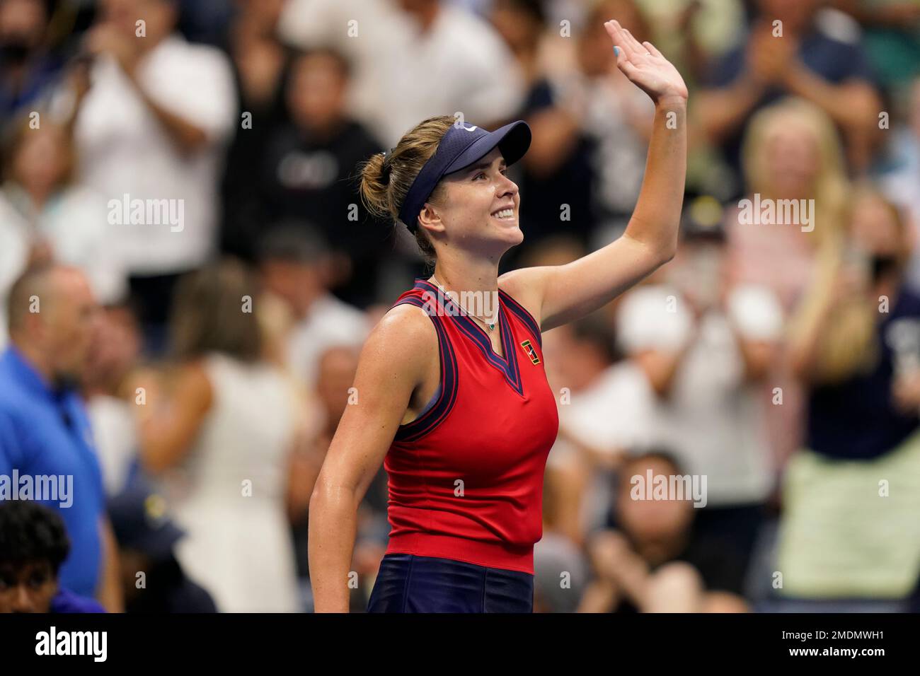 Elina Svitolina, of Ukraine, reacts after defeating Simona Halep, of ...