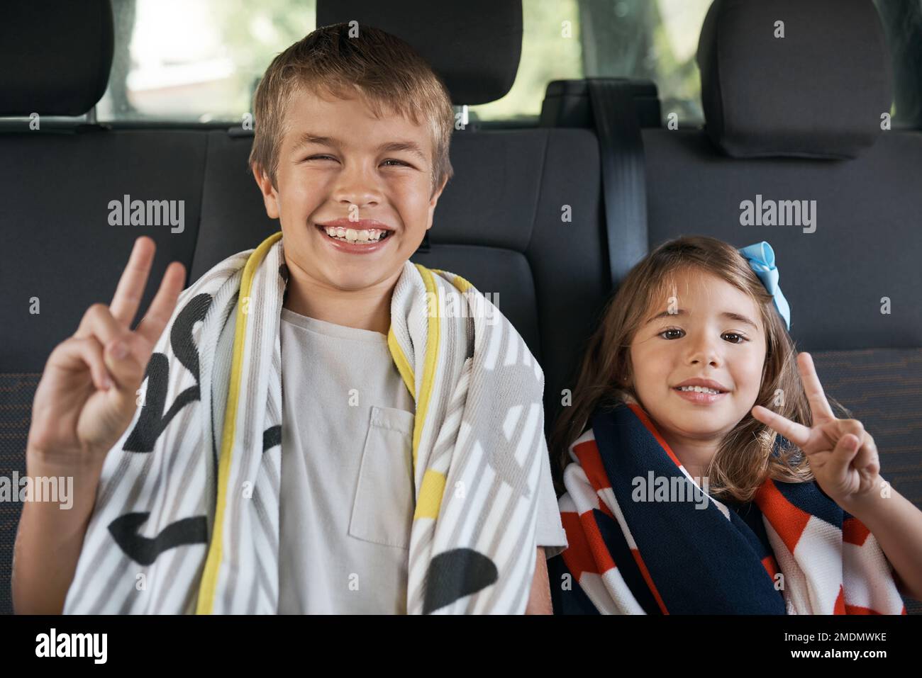 See you later. Cropped portrait of two young siblings sitting in the ...