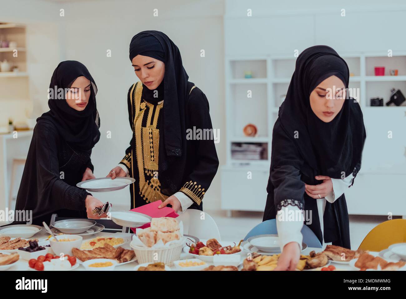 Eid Mubarak Muslim family having Iftar dinner young muslim girls ...