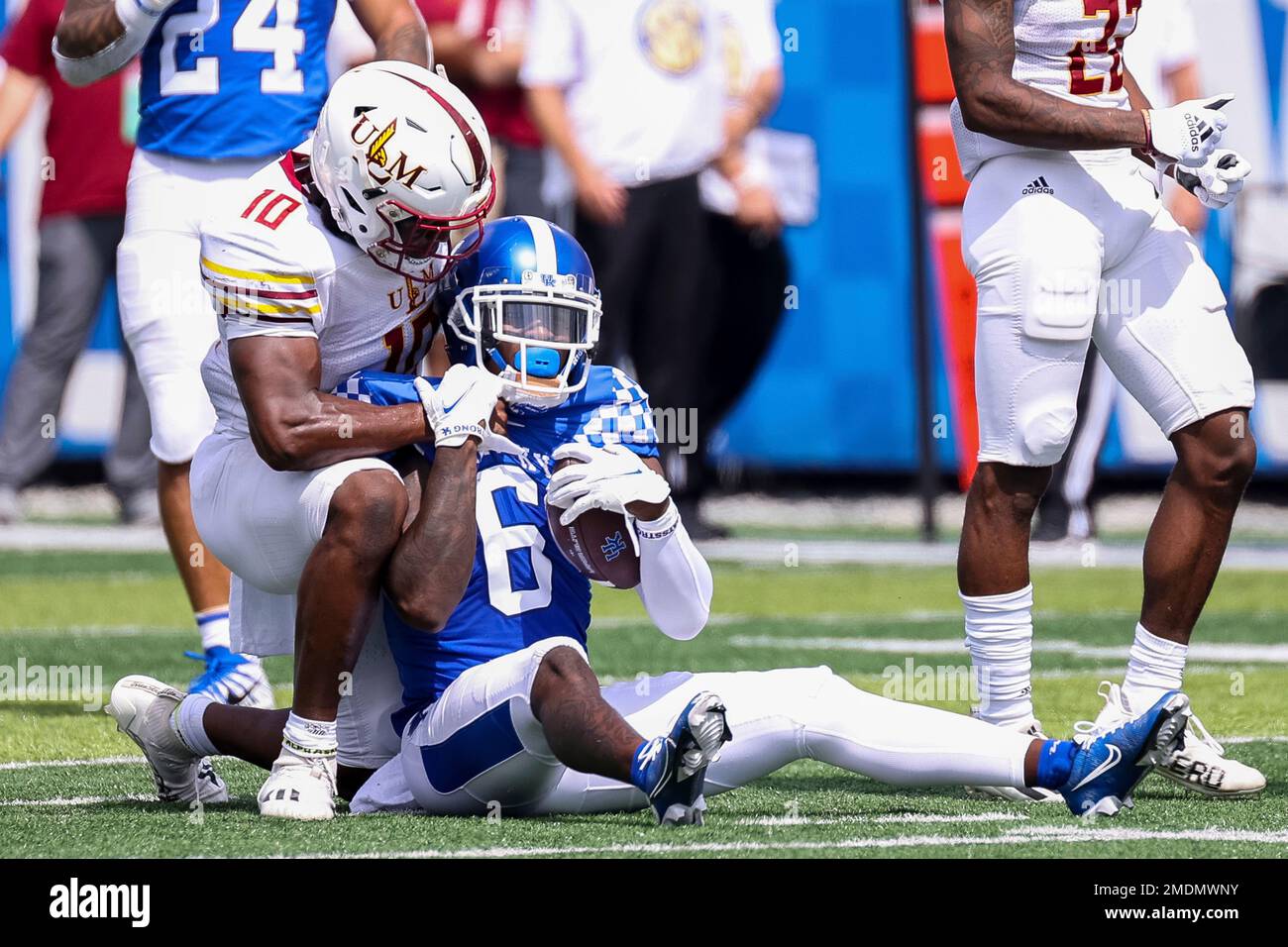 Kentucky wide receiver Josh Ali (6) gets tackled by Louisiana-Monroe ...