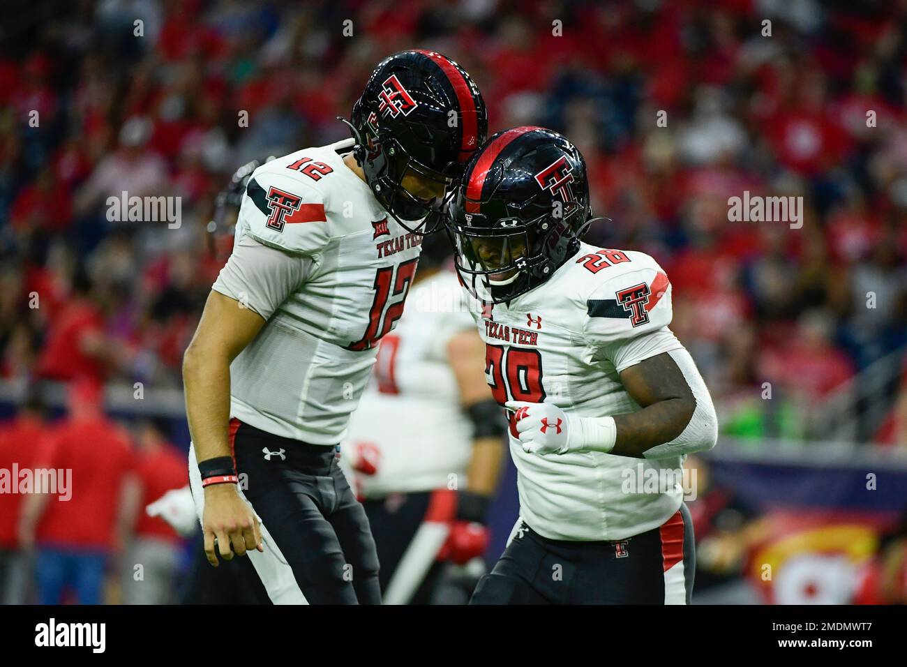 Texas Tech quarterback Tyler Shough (12) and Texas Tech running back ...