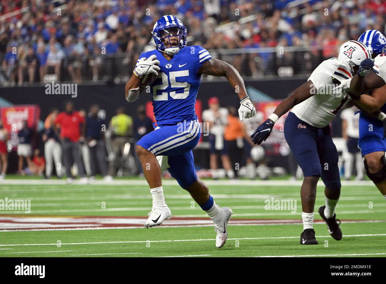 BYU running back Tyler Allgeier (25) runs for a touchdown against ...