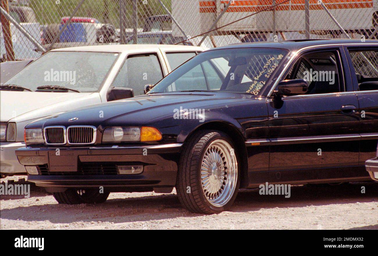 FILE - In this Sept. 8, 1996, file photo, a black BMW, riddled with ...