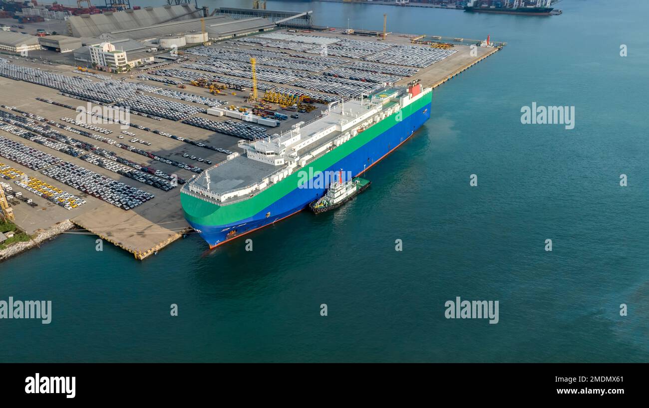 New cars lot at terminal port for export transport by ship. Cargo ship ...