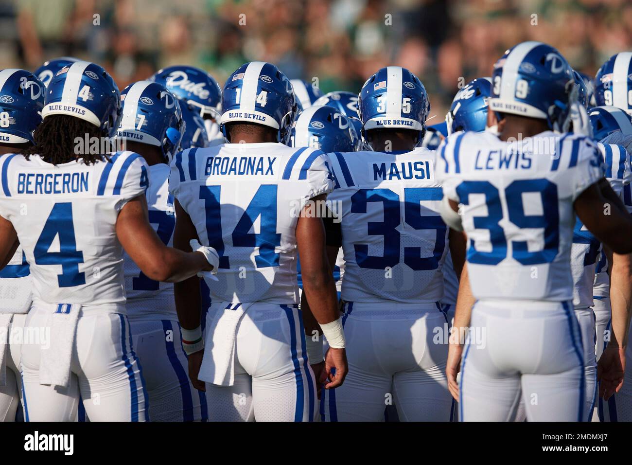 Members of the Duke Blue Devils huddle up prior to an NCAA football ...