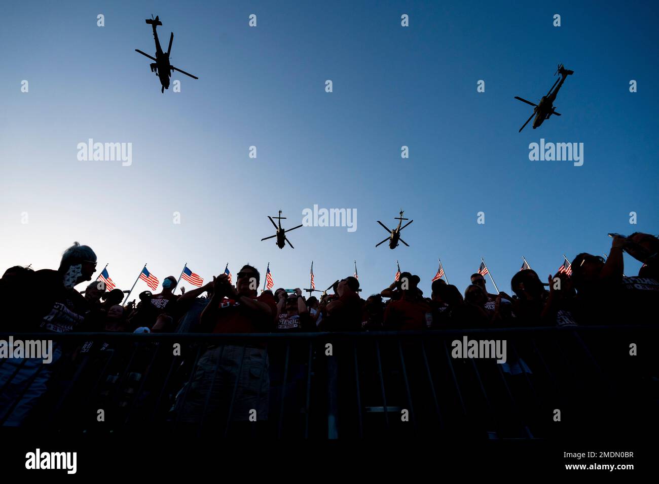 US Army helicopters fly over Kyle Field as part of a military flyover ...