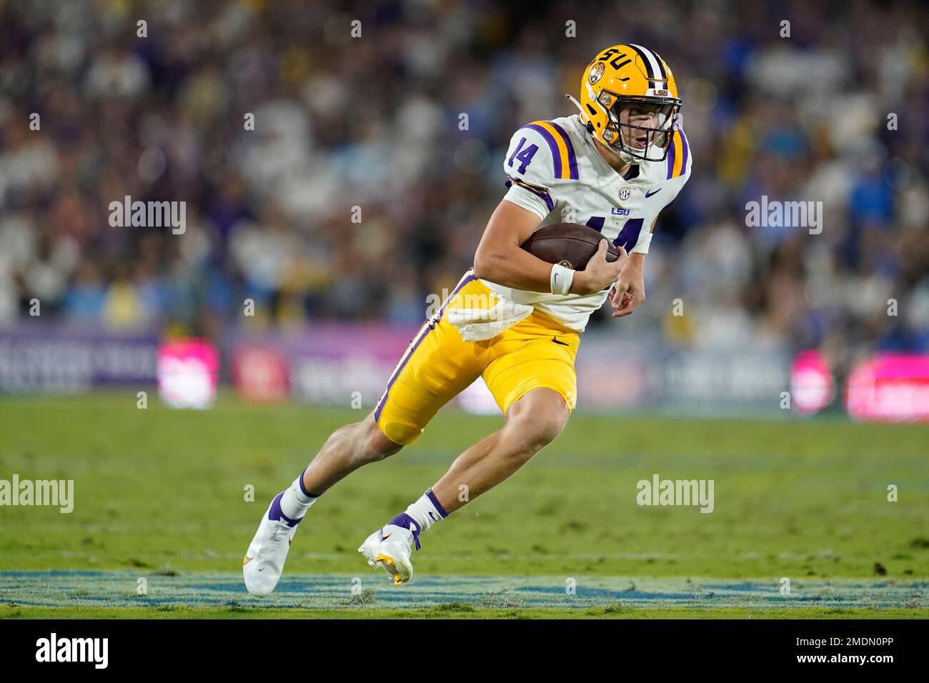 LSU quarterback Max Johnson runs against UCLA during the second half of ...