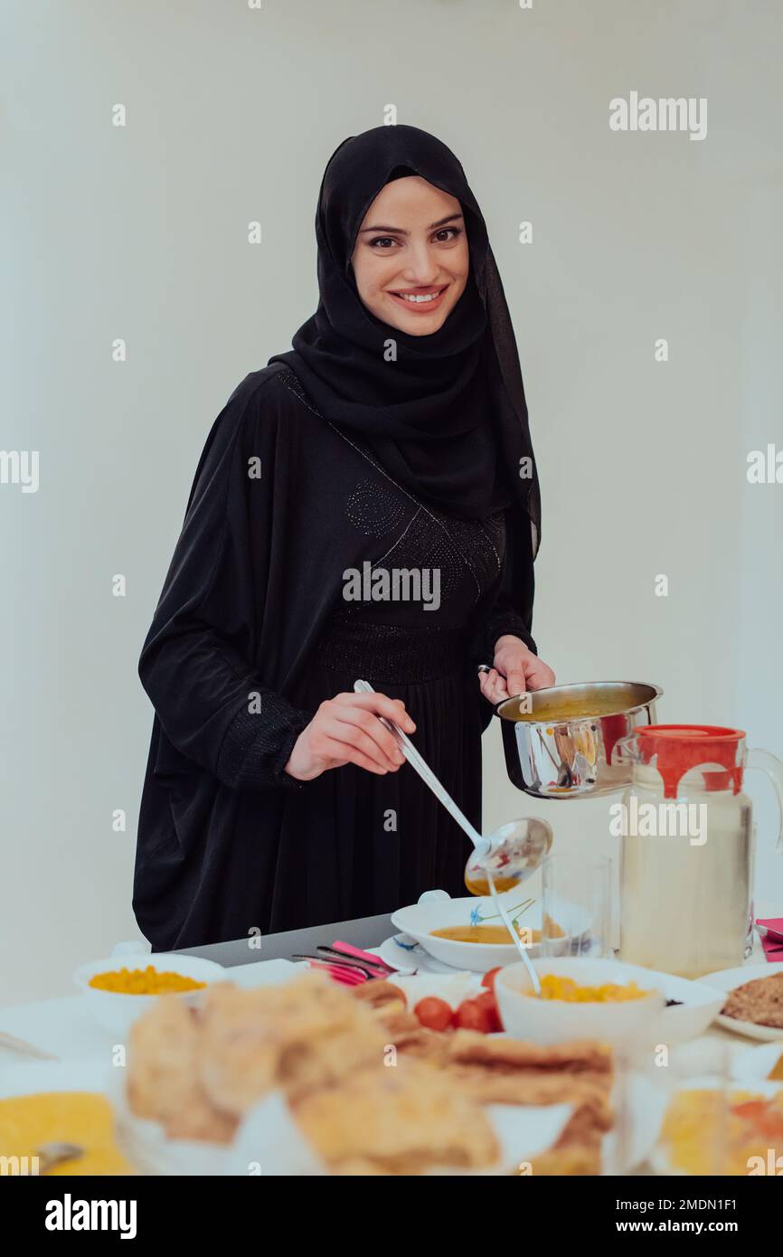 Modern hijab woman dining hi-res stock photography and images - Alamy