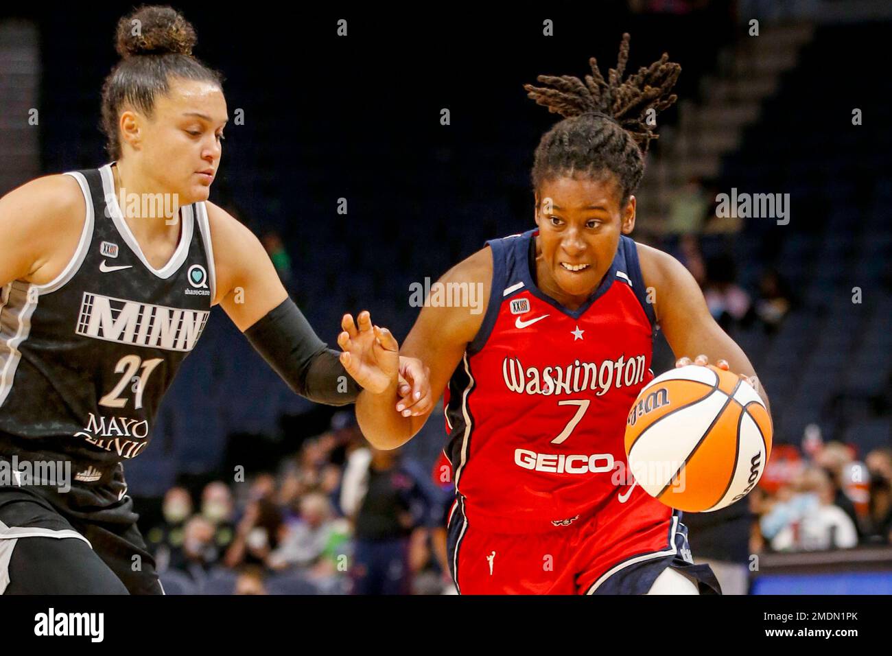 Washington Mystics guard Ariel Atkins (7) drives around Minnesota Lynx ...