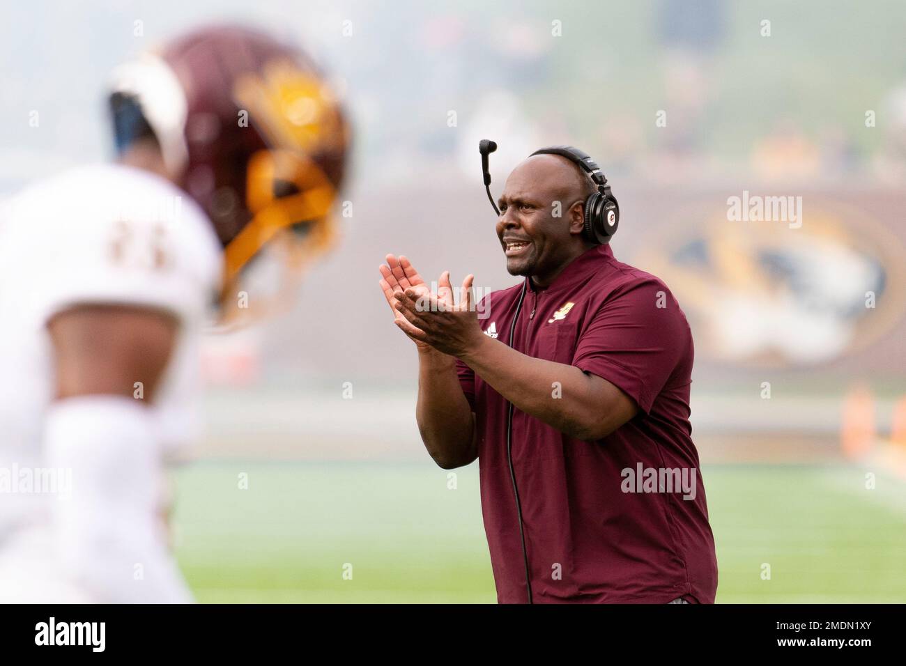 Central Michigan assistant coach Tim Skipper encourages his team during ...