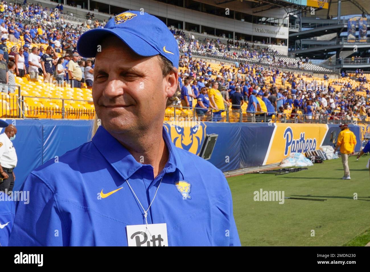 Pittsburgh alumnus Chris Bickell stands on the field before the NCAA ...