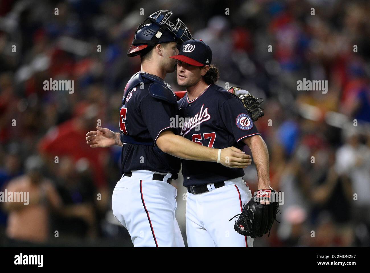 Washington Nationals relief pitcher Kyle Finnegan, right, and catcher ...