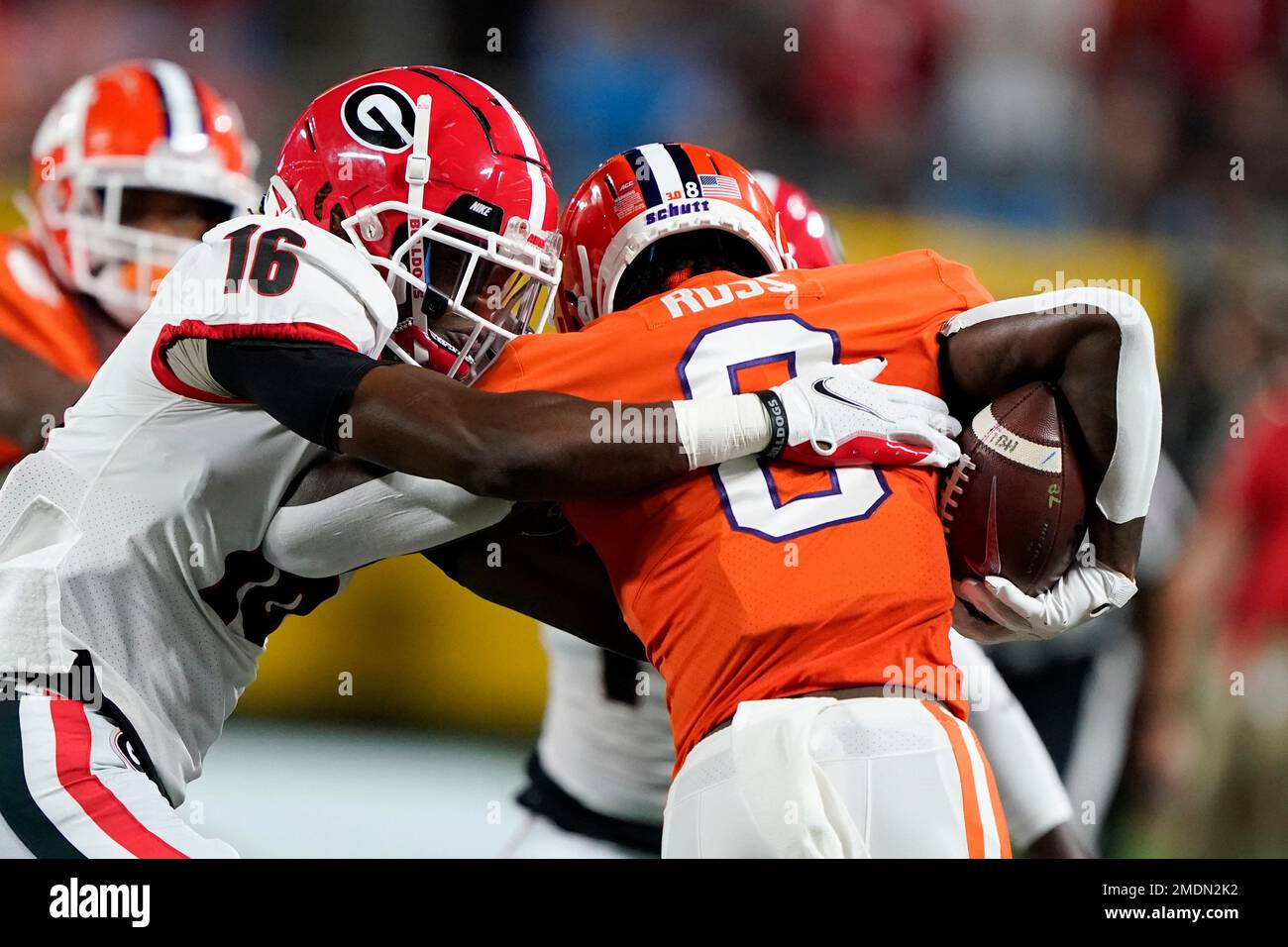 Clemson wide receiver Justyn Ross is tackled by Georgia defensive back ...