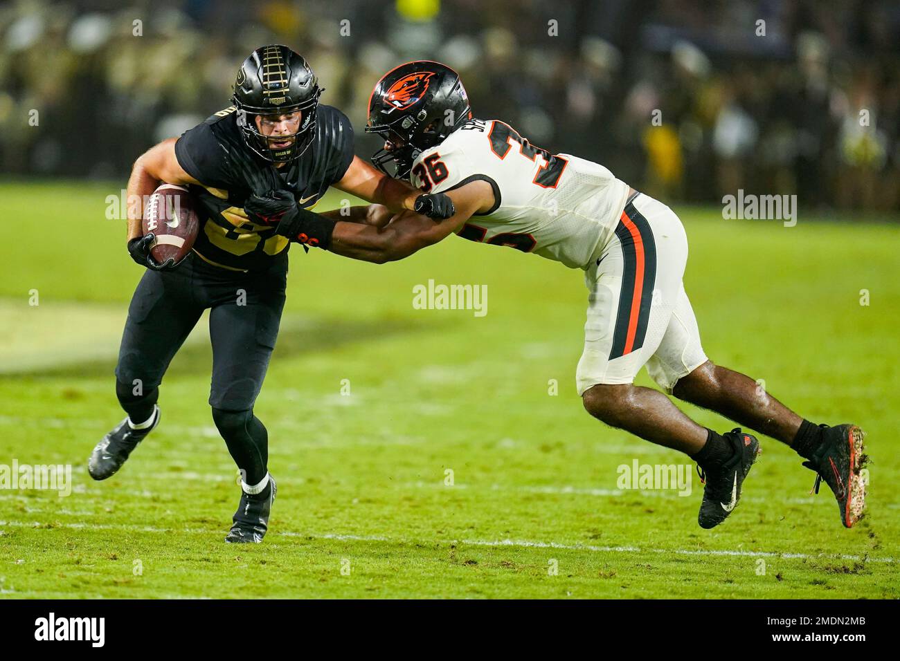 Purdue wide receiver Jackson Anthrop (33) is tackled by Oregon State ...