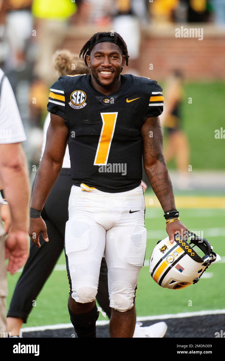 Missouri running back Tyler Badie smiles as he walks off the field ...
