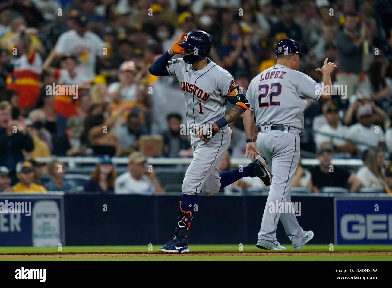 Houston Astros' Carlos Correa watches his three-run home run hit during ...