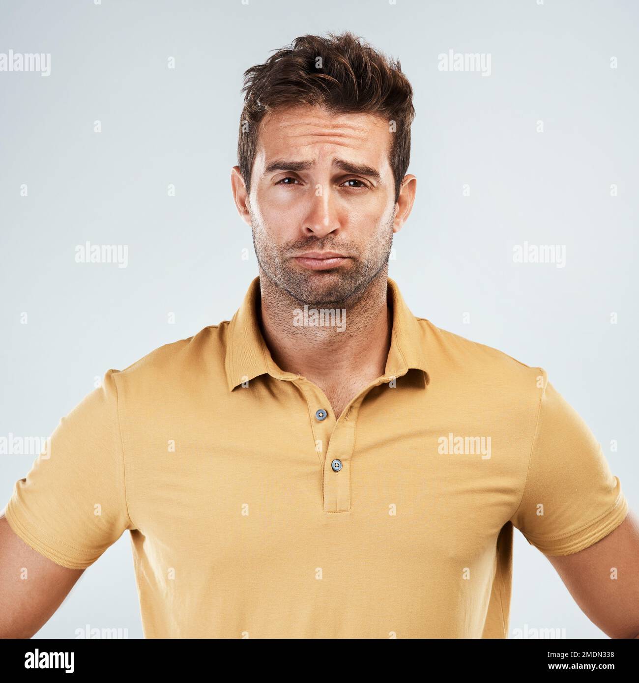 Im not too happy today. Portrait of a young man with an sad facial ...