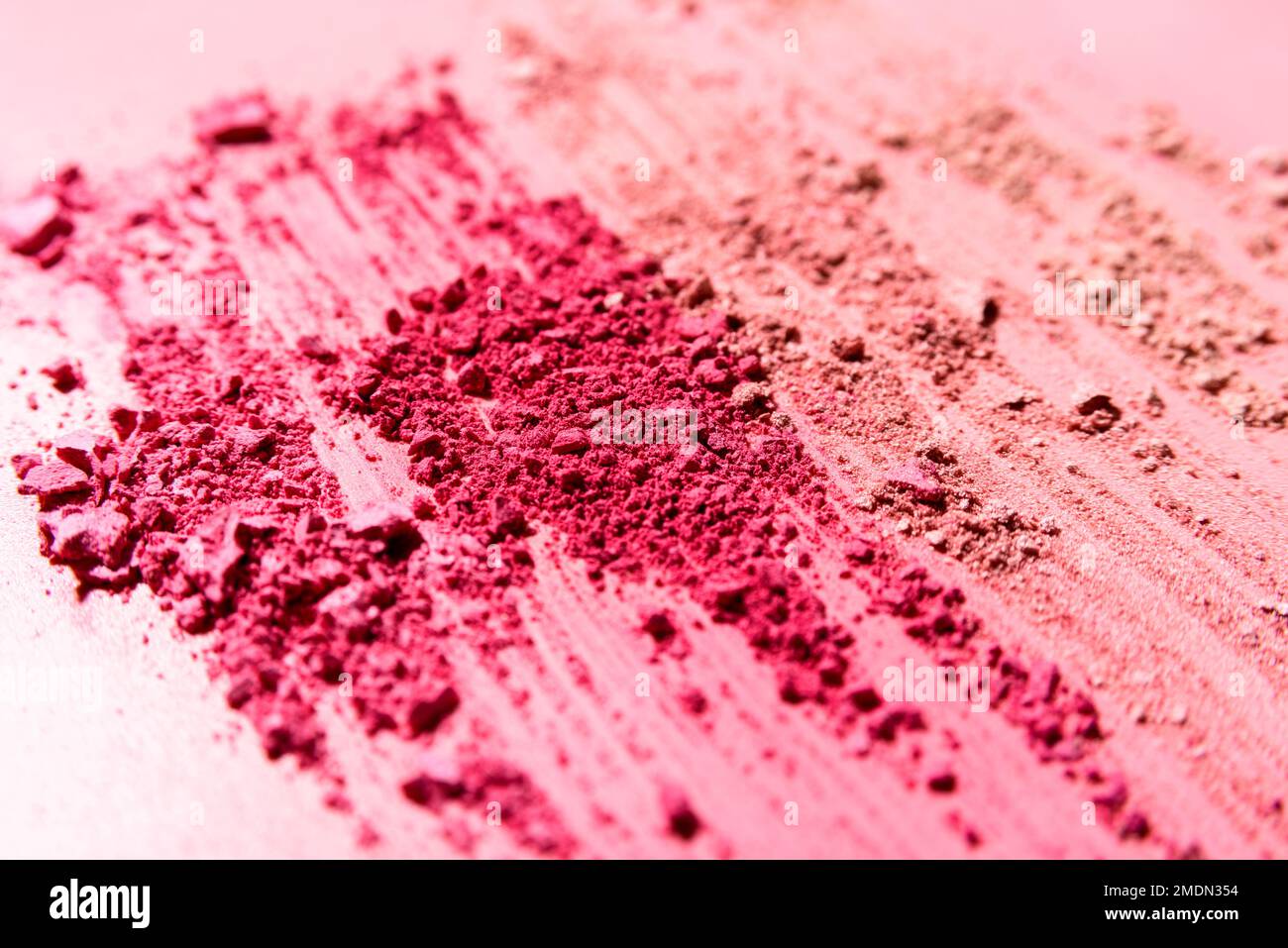 Abstract diagonal composition made from crushed face powder and blush ...