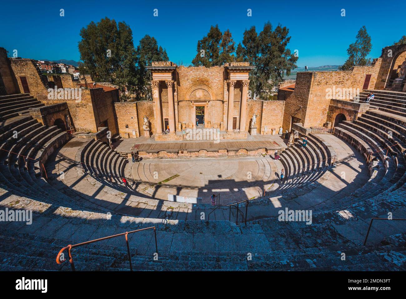An ancient Roman Theater of Guelma with sculptures and columns under ...
