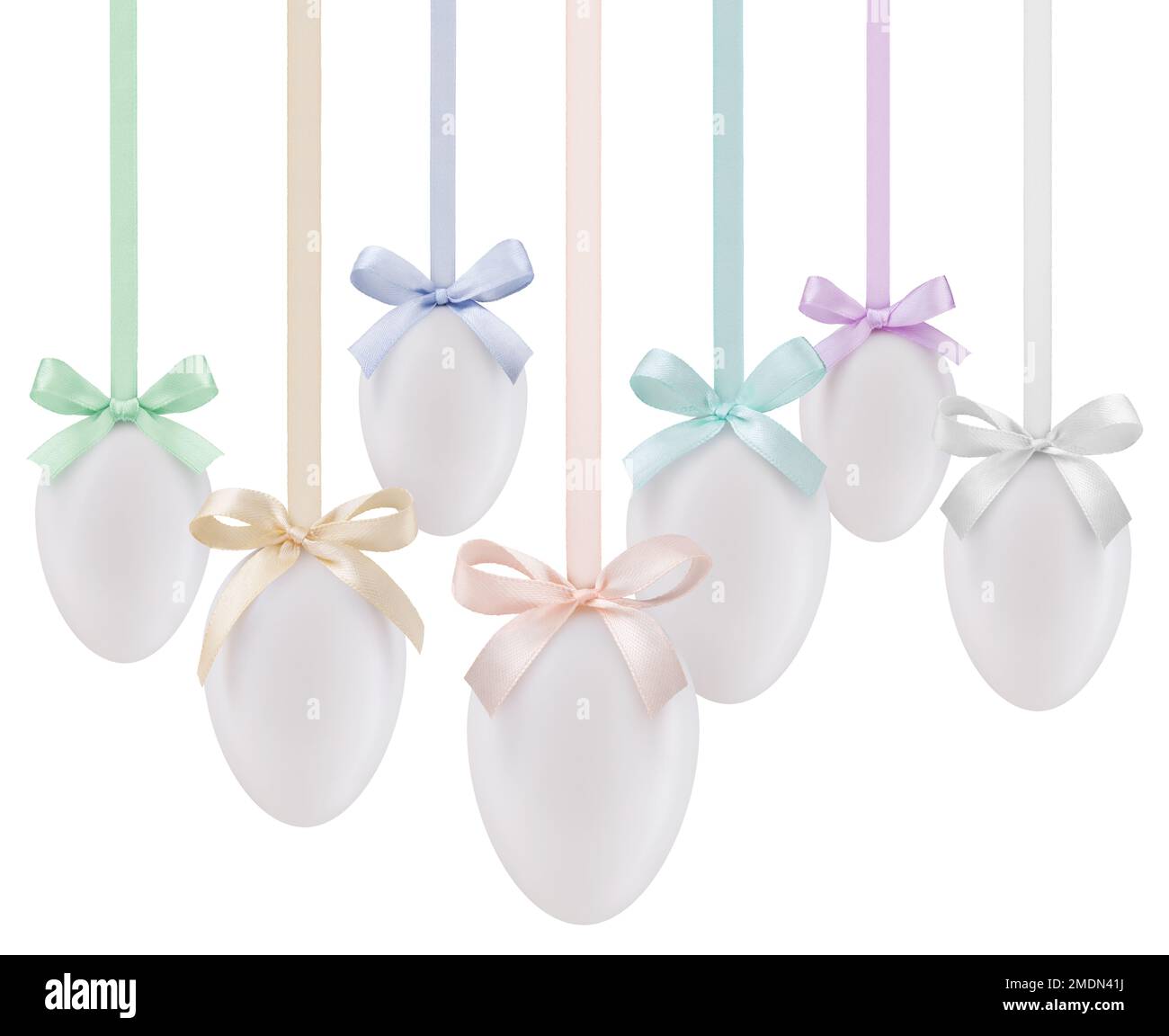 happy Easter decorations white eggs with shiny ribbons bows in pastel ...