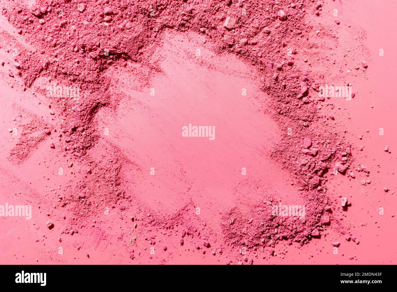 Abstract waves composition made from crushed blush on pink background ...