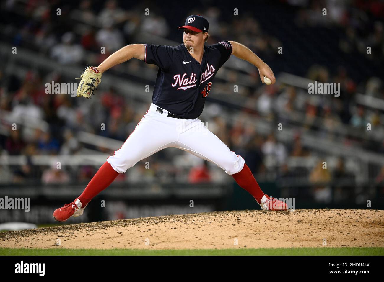 Washington Nationals relief pitcher Sam Clay (49) delivers a pitch ...