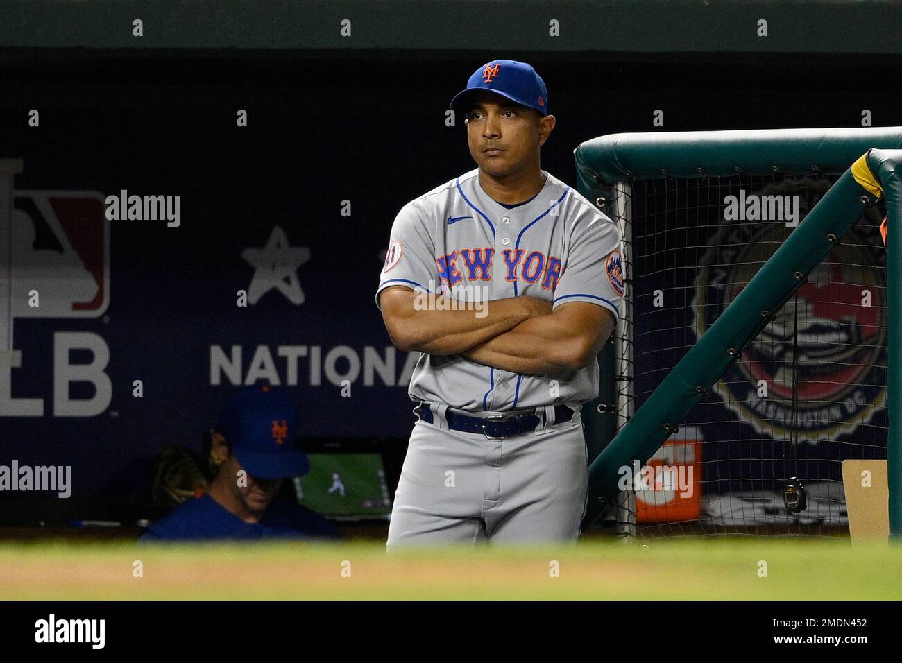 New York Mets manager Luis Rojas (19) watches during a baseball game ...