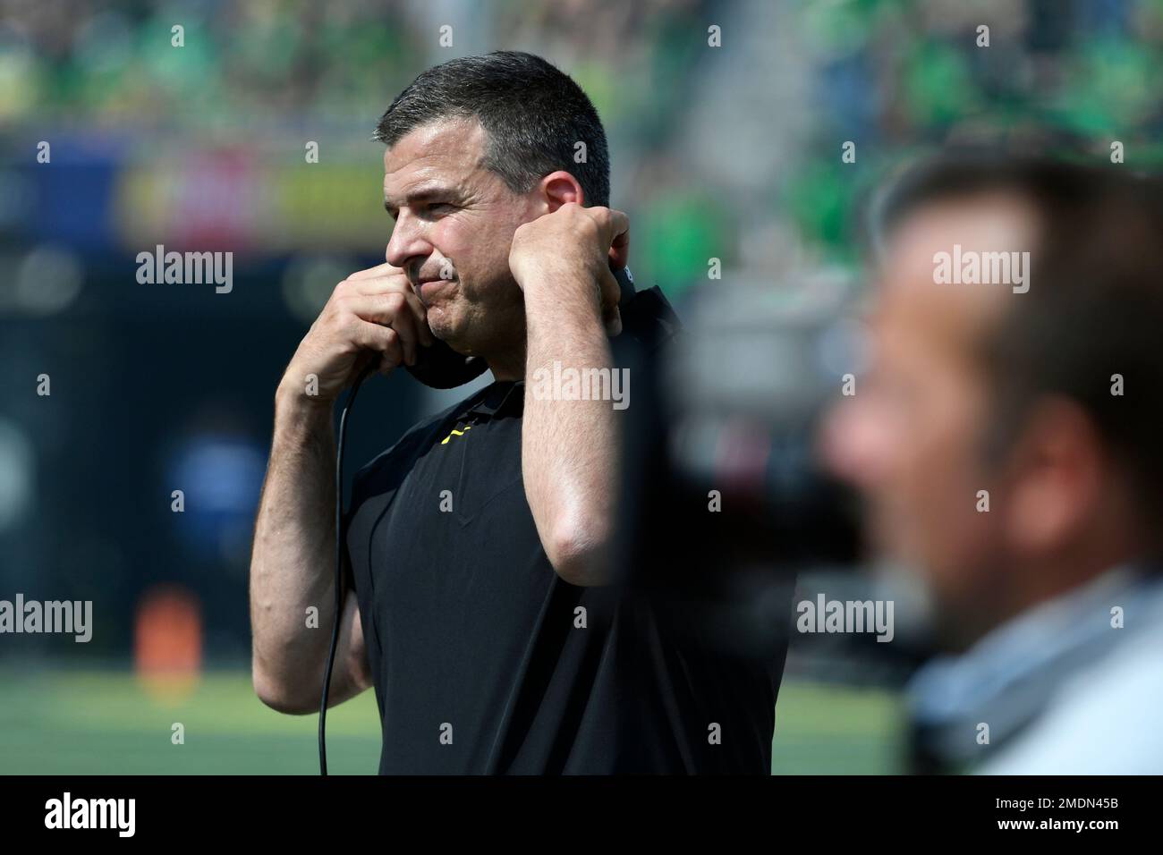 Oregon head coach Mario Cristobal watches his team during the second ...